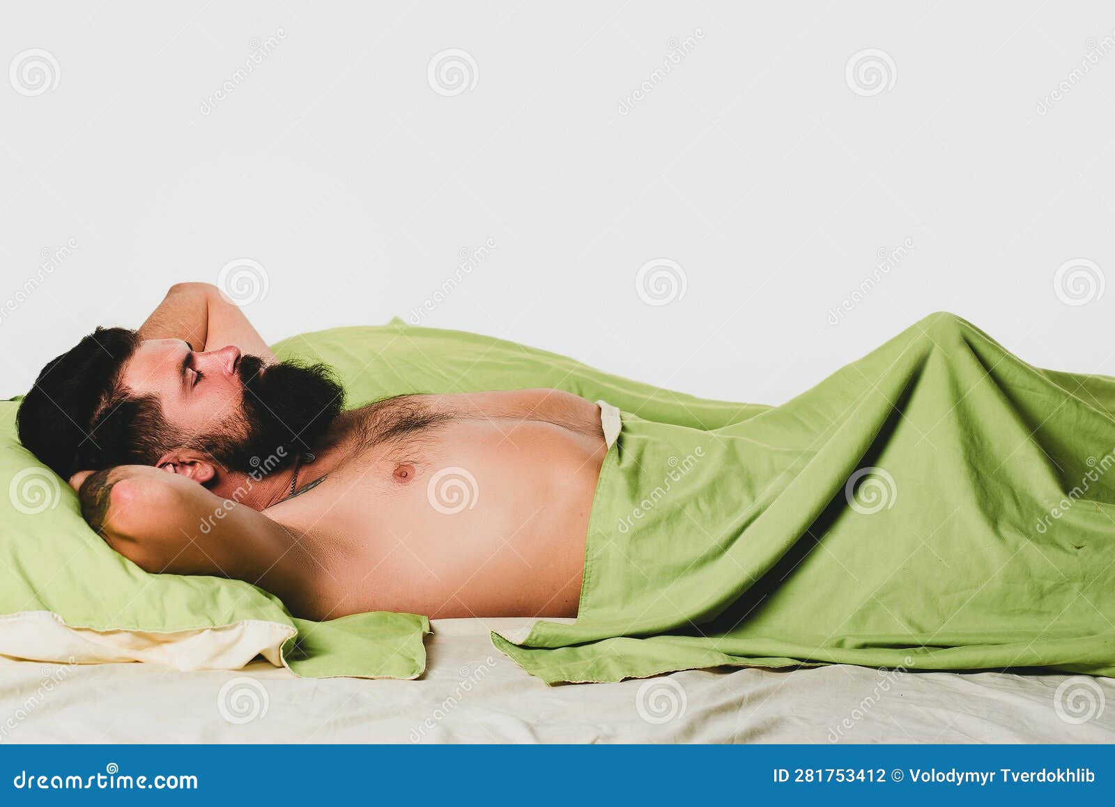 Sexual Potency. Imitating Erection. Man Lying in Bed and Sleeping ...