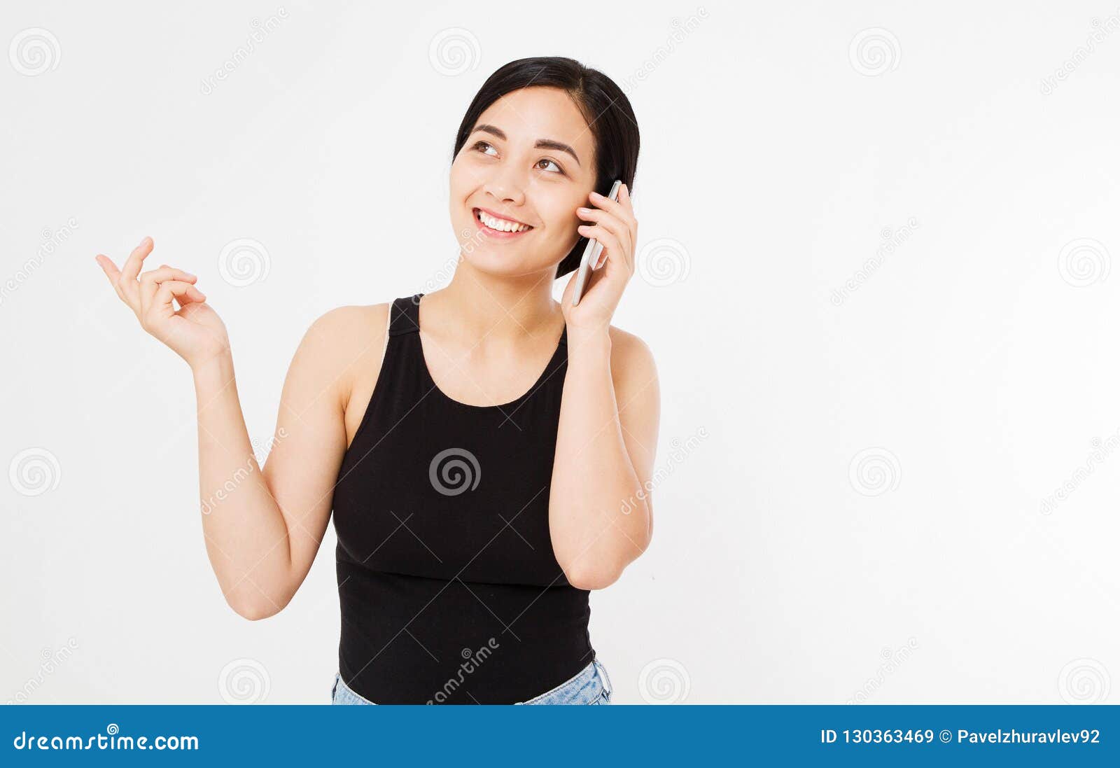 Asian Korean Woman Talking On Mobile Phone Isolated On White Background