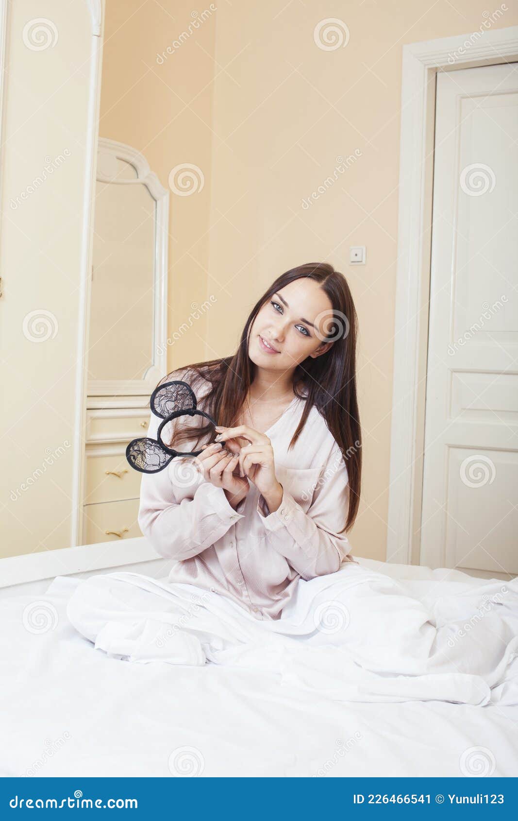Beautiful Brunette Woman Lying In Bed Sensual Looking At Camera