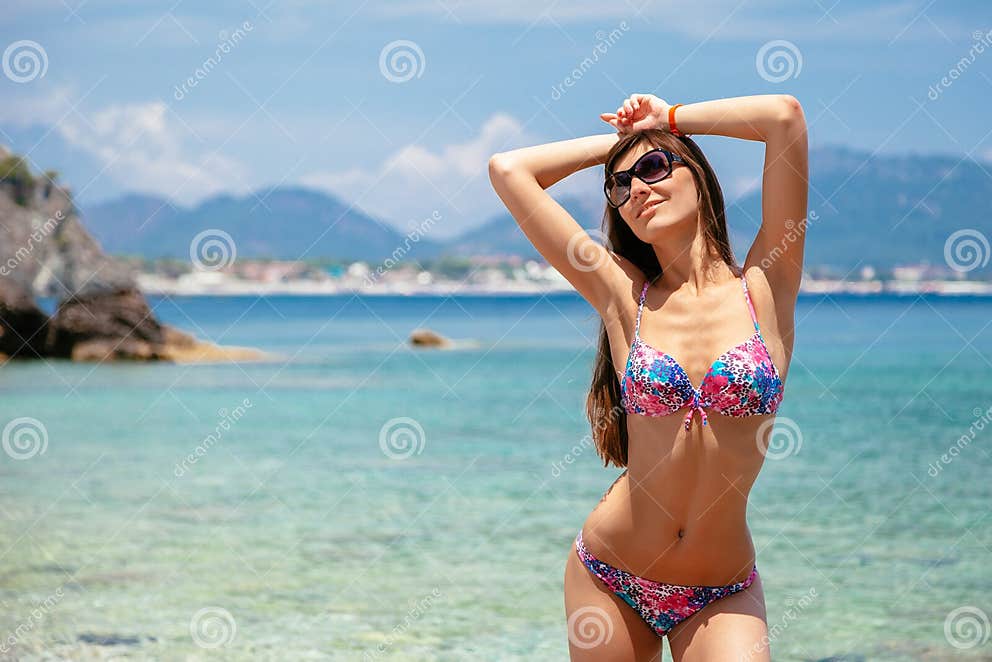 Beautiful Woman In Bikini And Sunglasses On Sea Background Sea Coast