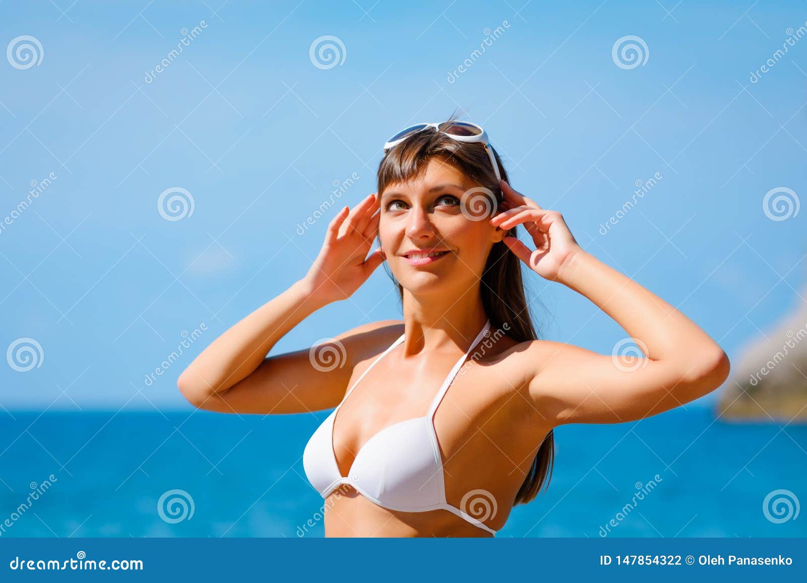 Beautiful Woman In White Bikini With Creative White Sunglasses On