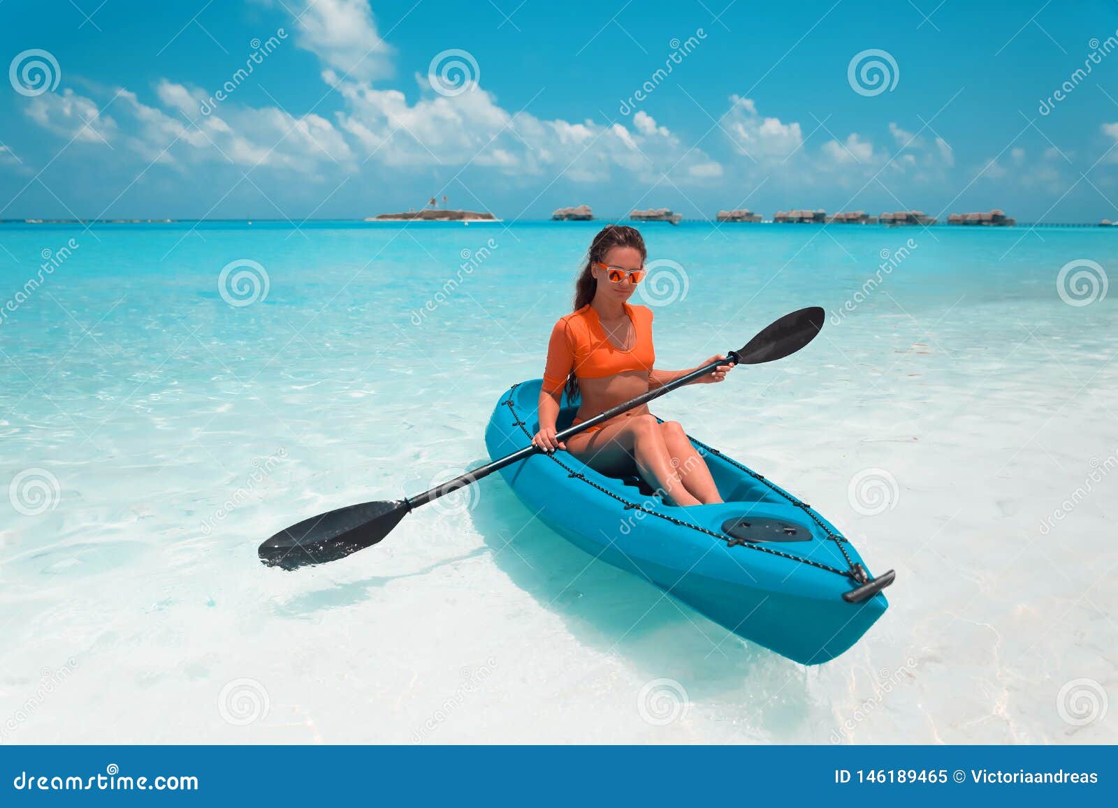Brunette Paddling A Kayak Woman Exploring Calm Tropical Bay Maldives Sport Recreation Stock