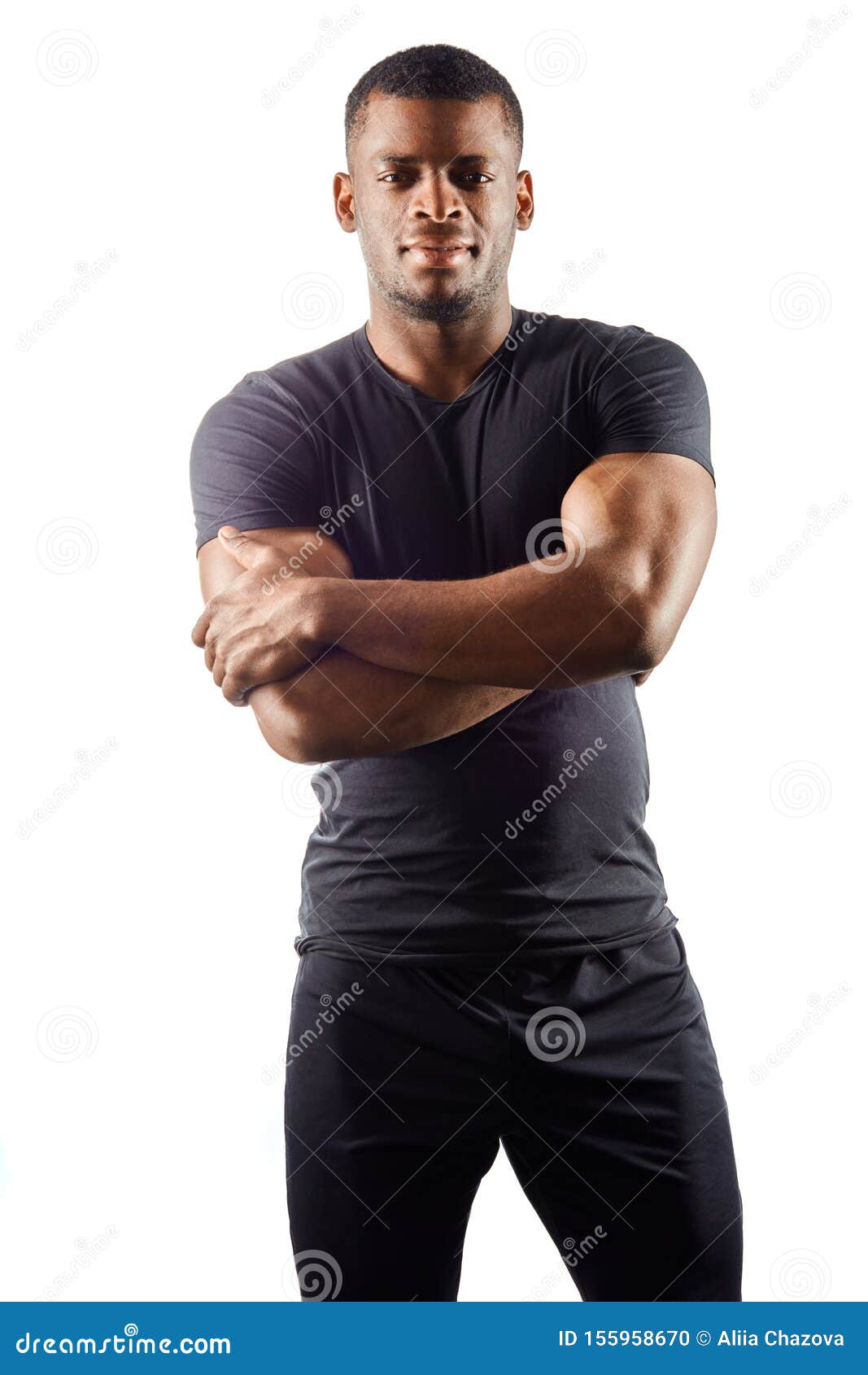 Sexy, Brutal, Muscular Man in Black T-shirt Standing with Arms Crossed ... Sexy, Brutal, Muscular Man in Black T-shirt Standing with Arms Crossed ...