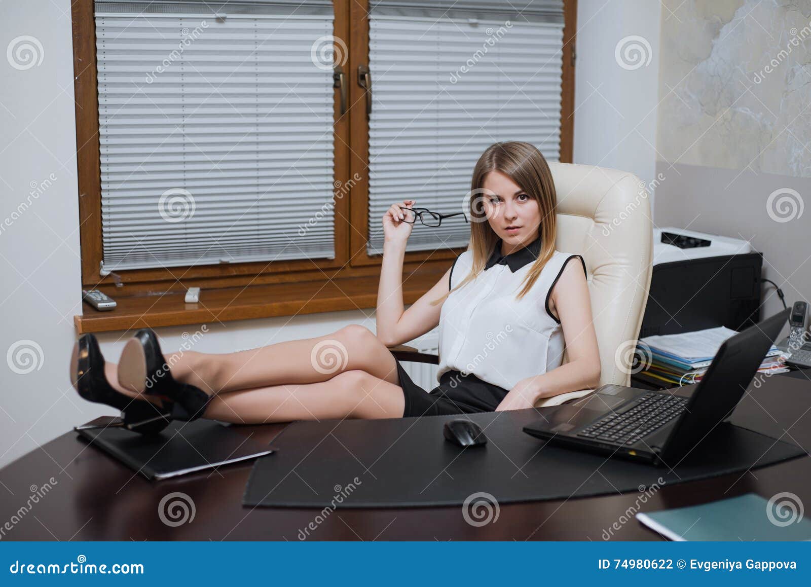 Business Woman is Sitting with Her Feet on the Desk Stock Photo - Image ... Business Woman is Sitting with Her Feet on the Desk Stock Photo - Image ...