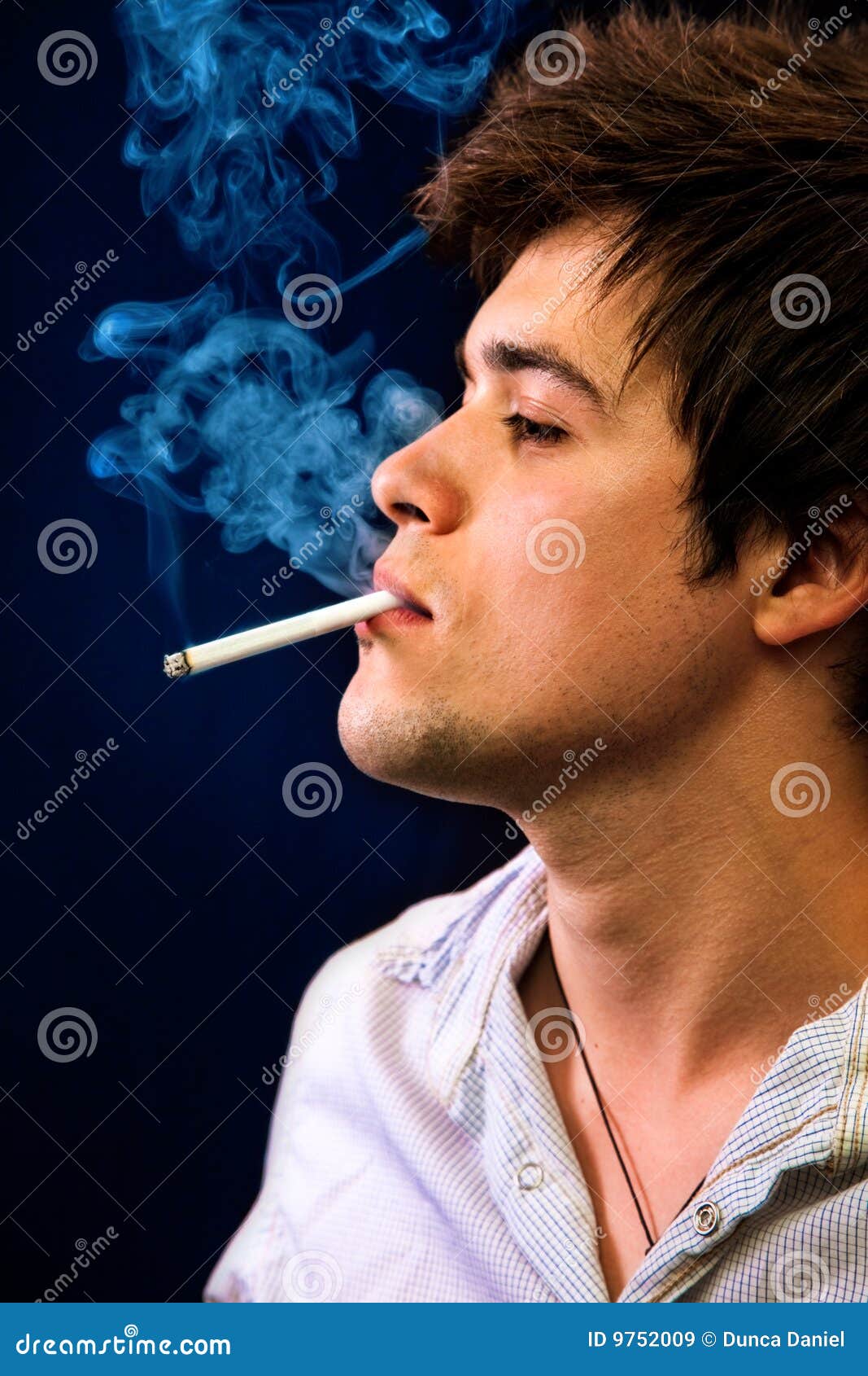 Cool Young Man Smoking a Cigar Stock Image - Image of cigarette ...