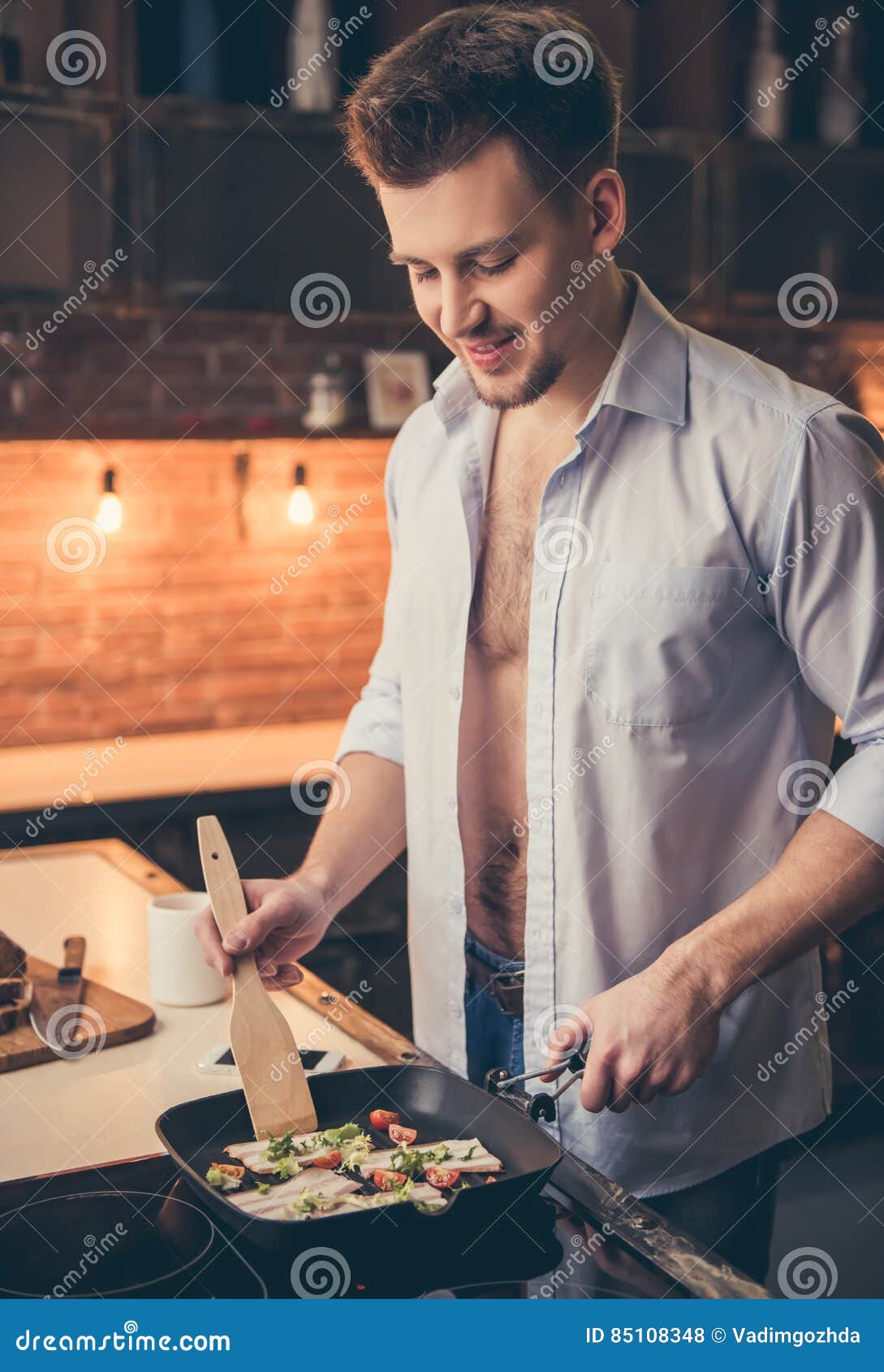 Guy cooking stock photo. Image of person, attractive - 85108348
