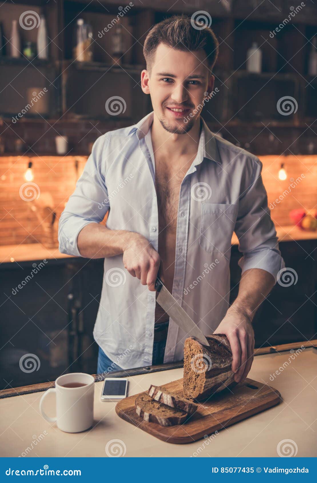Guy in the kitchen stock image. Image of knife, male - 85077435