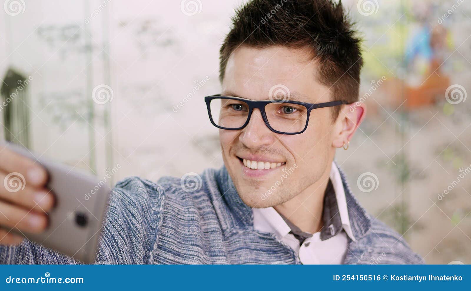 Handsome Young Man In Glasses Spectacles Makes Selfie At Optical Store Optics Optician Retail