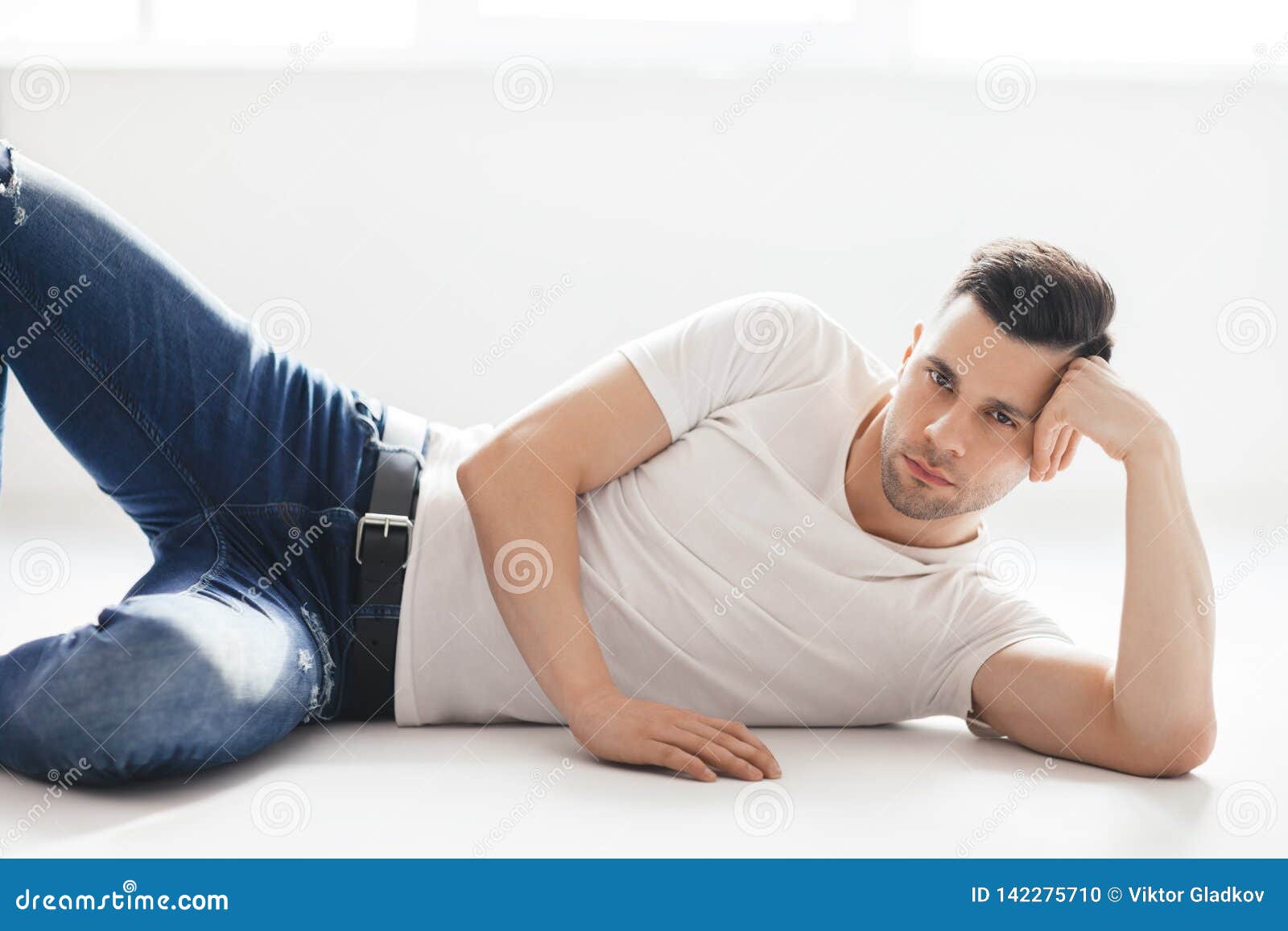 Handsome Man Lying on Floor Stock Photo - Image of concept, relax ...