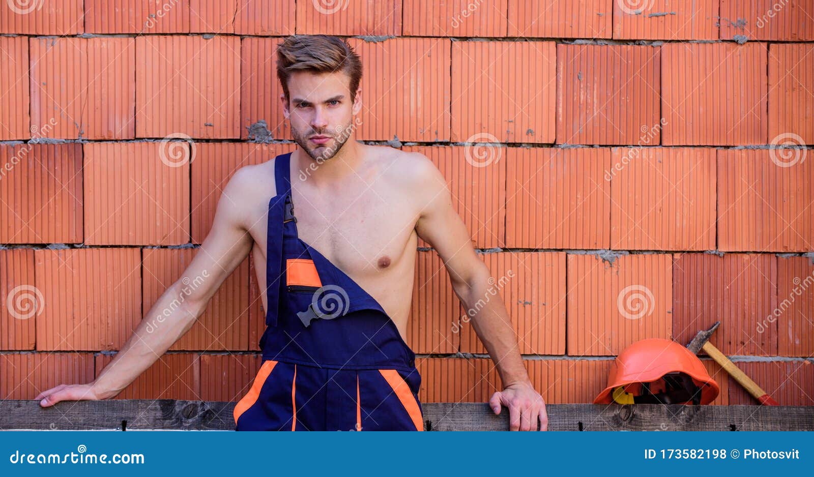 Laborer. Attractive Worker. Handsome Man Wear Overalls. Construction ...