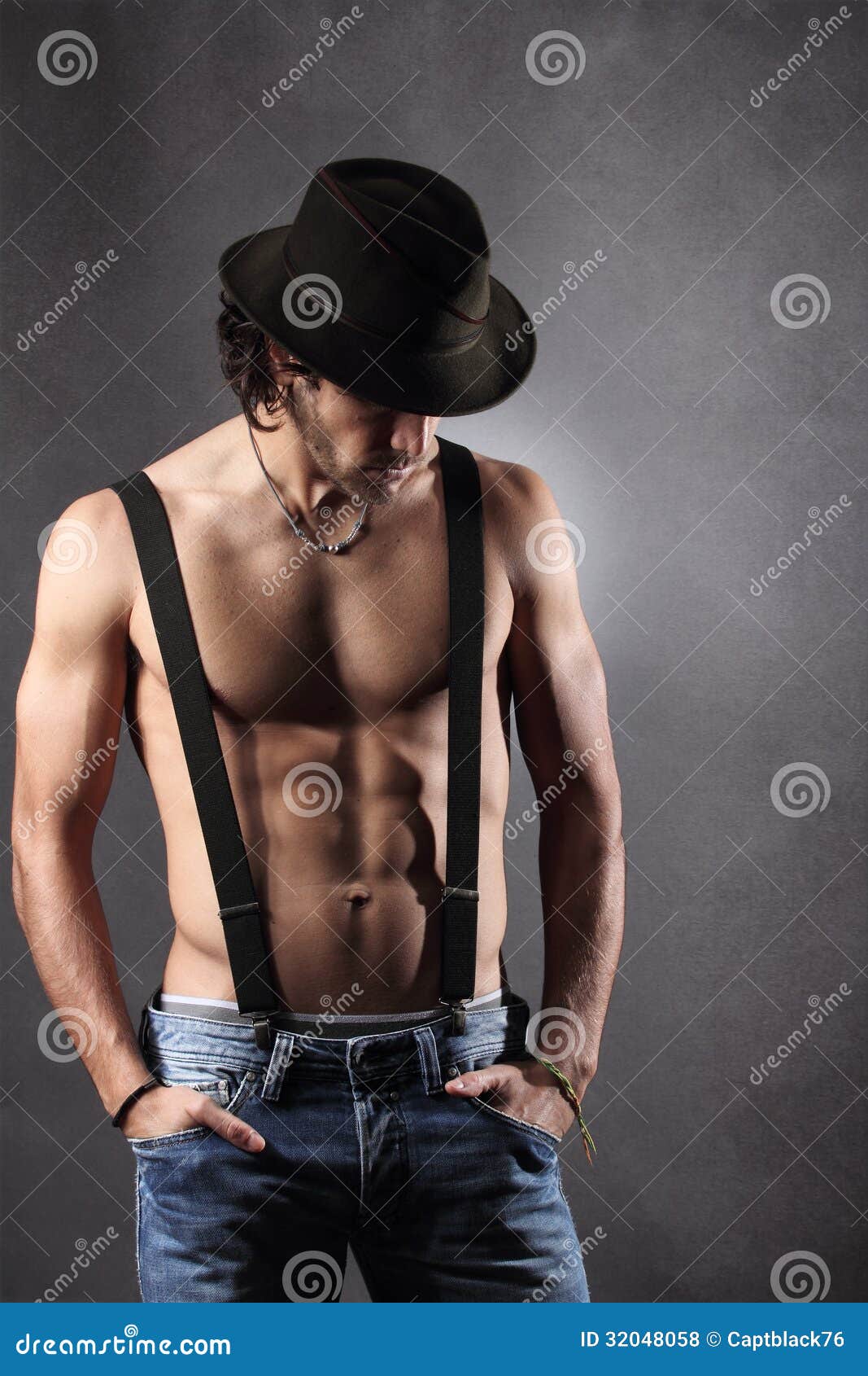 Male Model with Hat and Suspenders Stock Photo - Image of chest, macho ...
