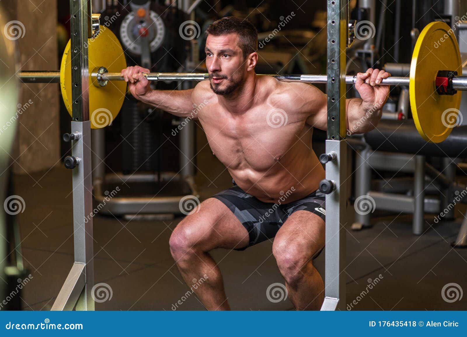 Muscular Man Doing Squat Exercise Stock Photo - Image of attractive ...