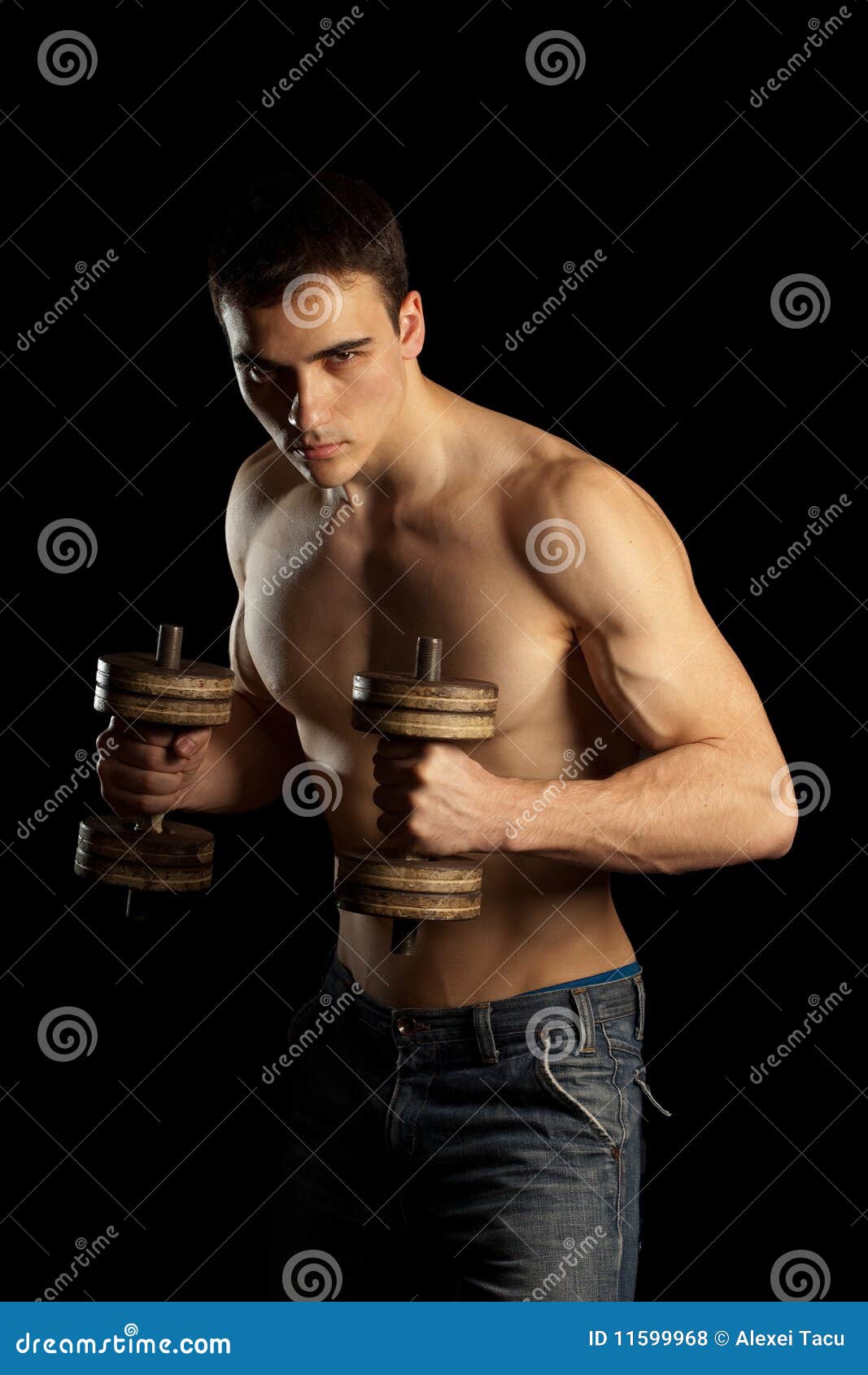 Muscular Man with Dumbells stock photo. Image of person - 11599968