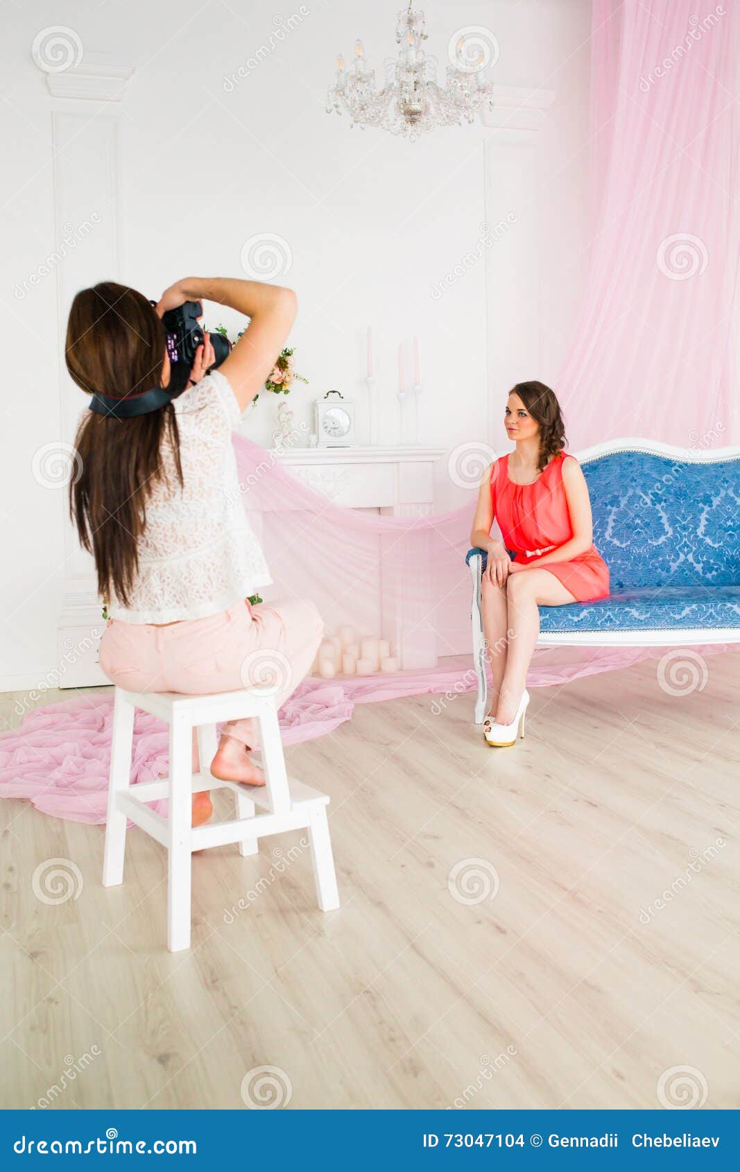 Photographer is Taking Pictures the Model in the Studio Stock Photo ...