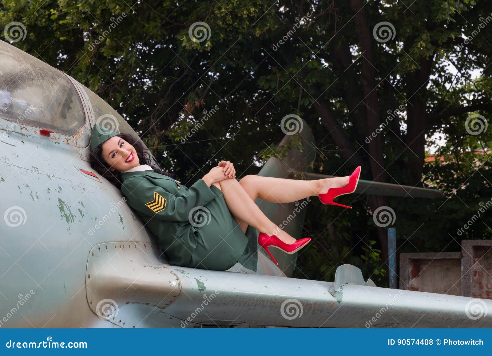 Pin-up Model in WW2 Uniform Stock Photo - Image of posing, airplane ...
