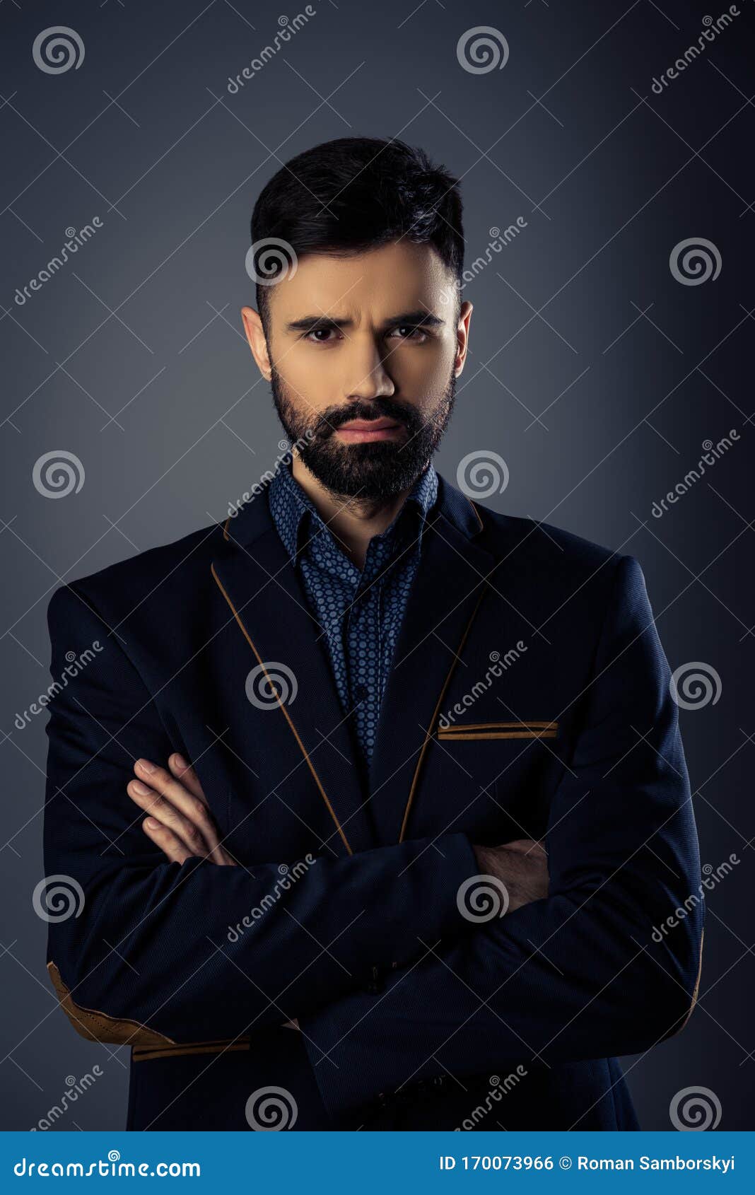Serious Man in Suit Posing with Crossed Hands Stock Photo - Image of ...