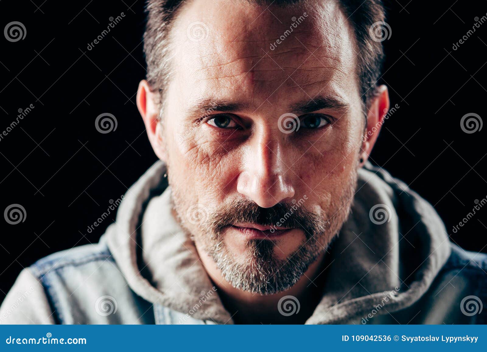Serious strong man stock photo. Image of showing, handsome - 109042536