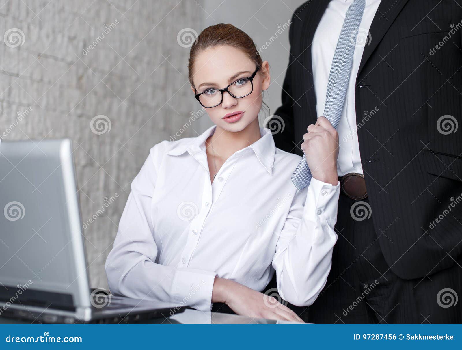 Smart Secretary Pulling Boss by Tie in Office Stock Photo - Image of ...