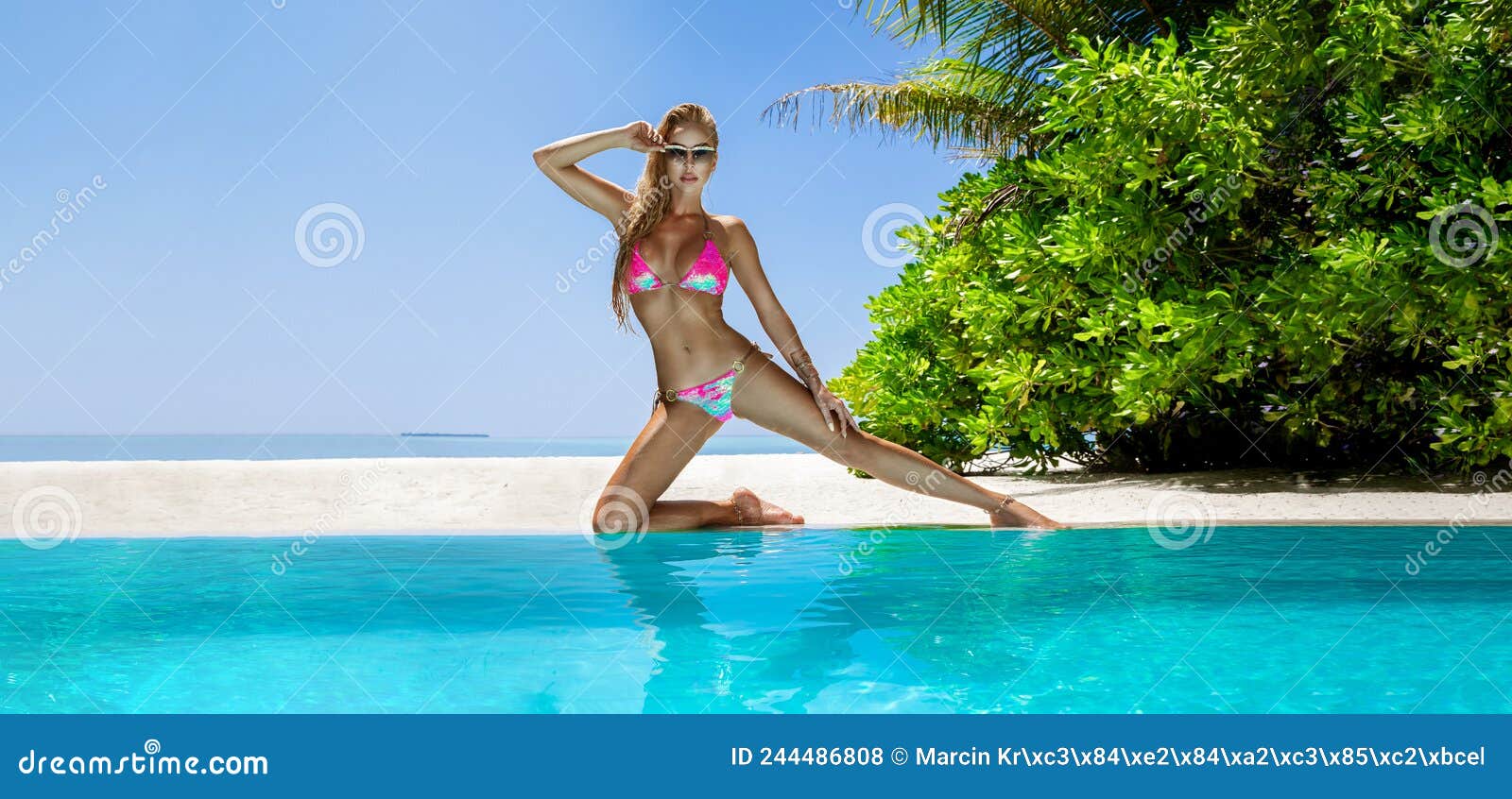 Woman In Bikini Near The Pool At Maldives Tropical Island Elegant