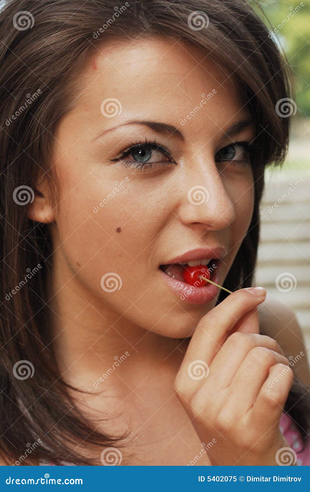 Woman eating cherry stock image. Image of mouth, ripened - 5402075