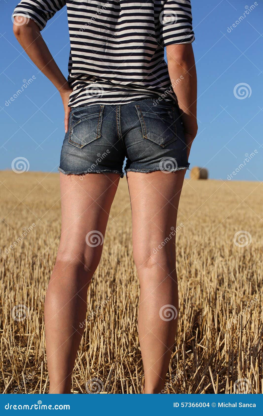 Legs Of Man In Shorts And Sneakers Standing On Beach Royalty Free Stock Image Cartoondealer