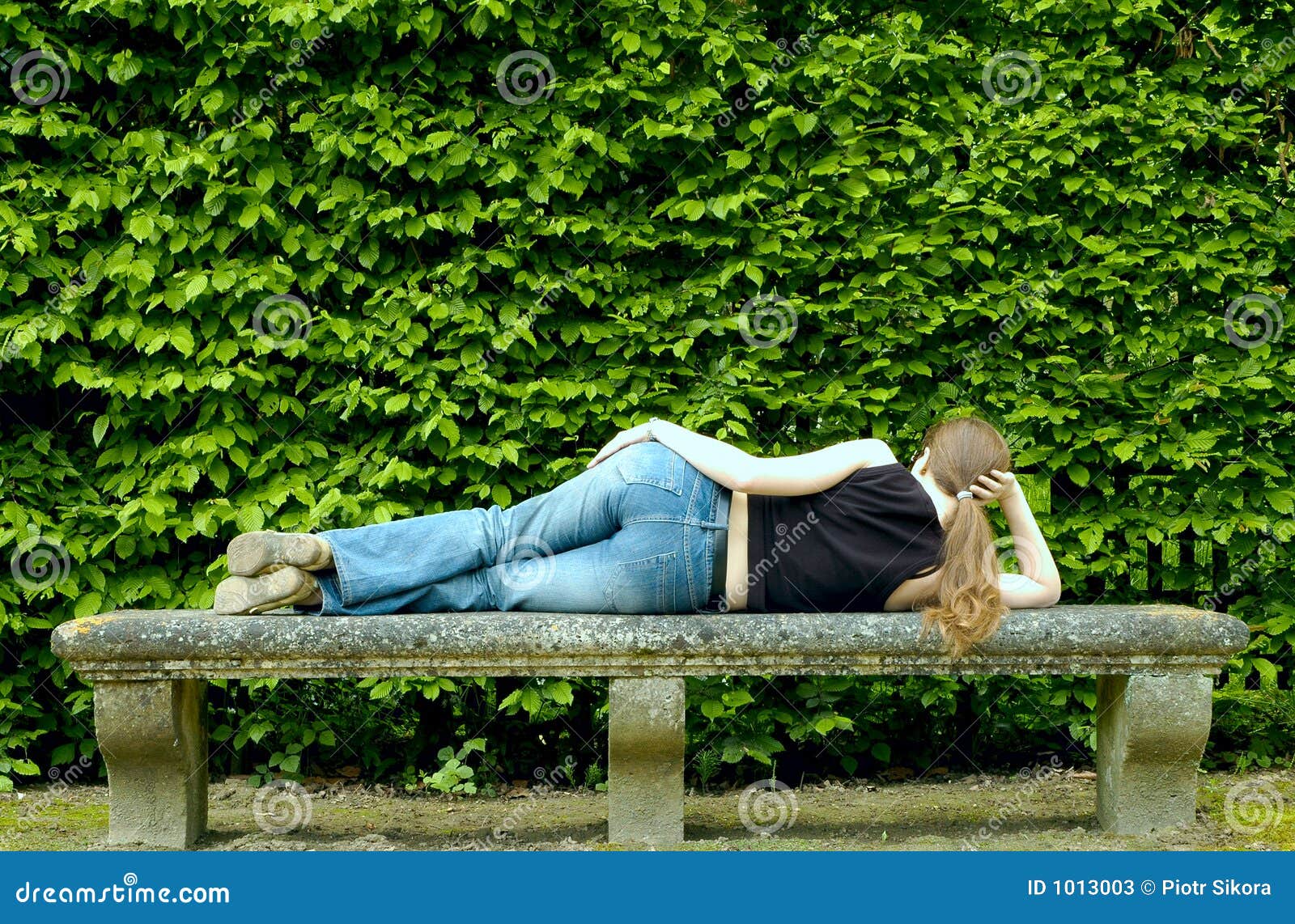 Woman lying on the bench stock image. Image of rest, pose - 1013003