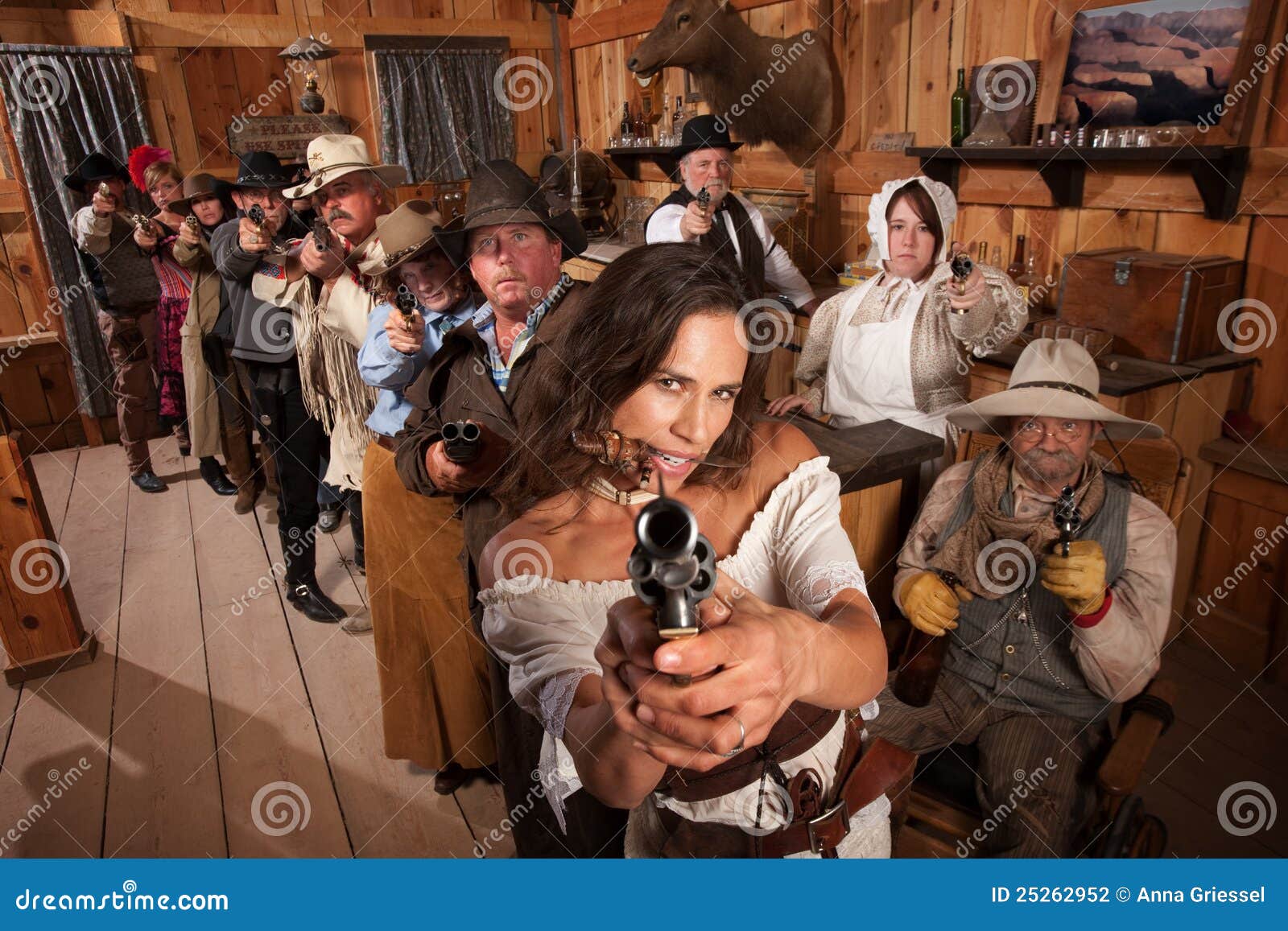 Woman Points Gun in Saloon stock photo. Image of beautiful - 25262952