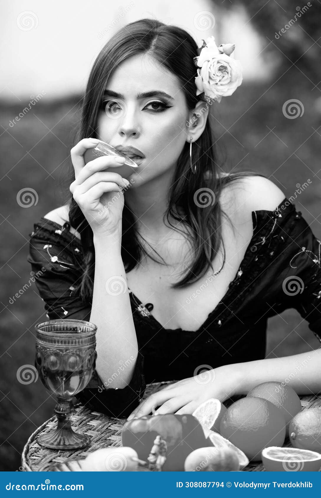 Woman With Red Lips Stylish Makeup On Beautiful Face Squeezing Juice