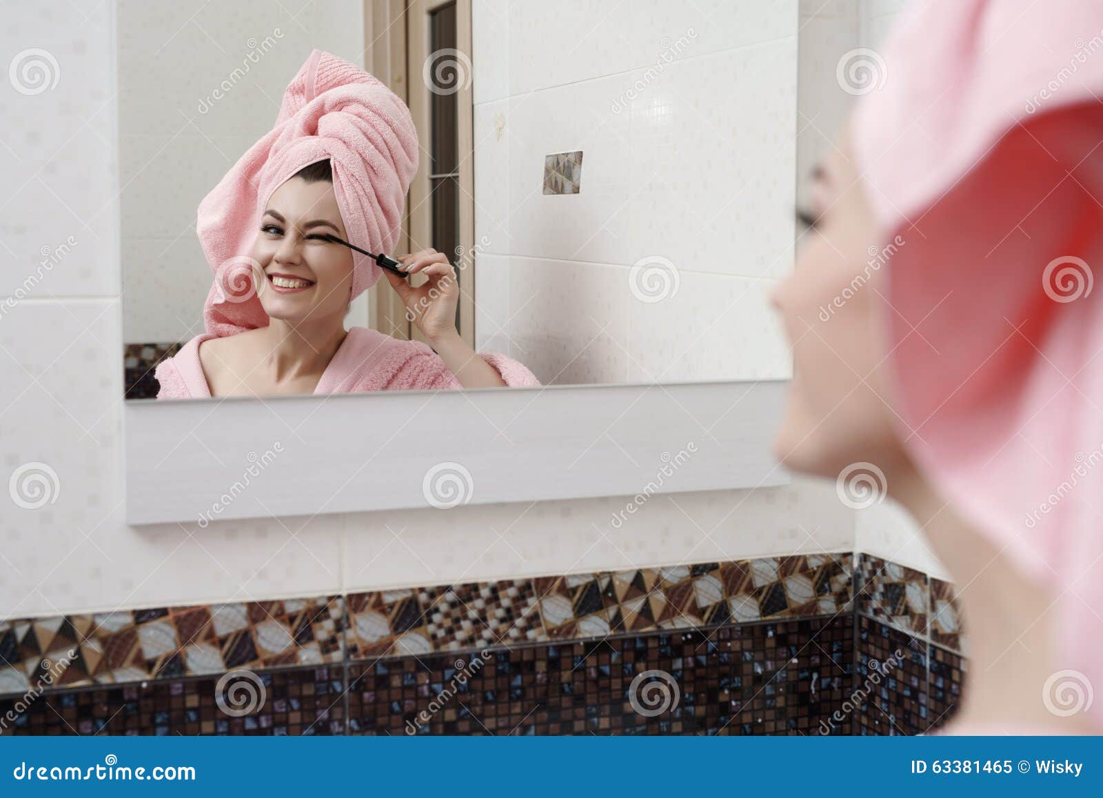 Woman Winks at Her Reflection Applying Makeup Stock Image - Image of ...