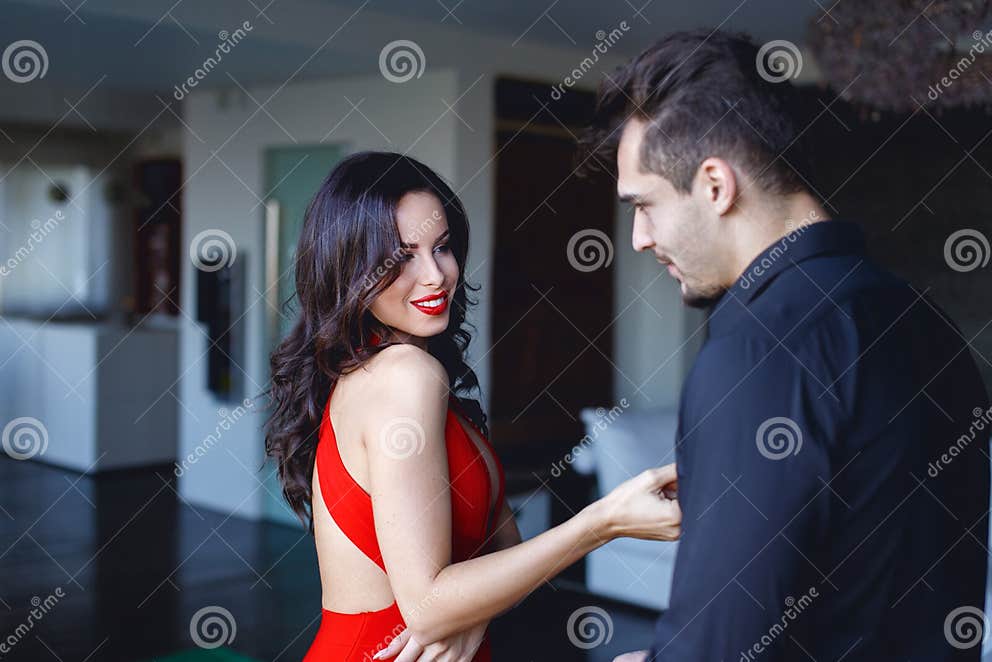 Woman In Red Flirting And Seducing Younger Man Stock Image Image Of Passion Intimate 168093393