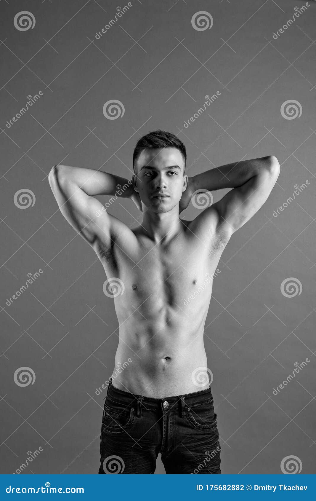Young Man Posing in Studio. Gray Background Stock Photo - Image of cool ...