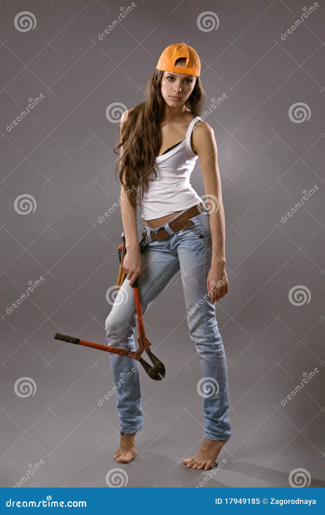 Young Woman Construction Worker Stock Image - Image of jeans, jumpsuit ...