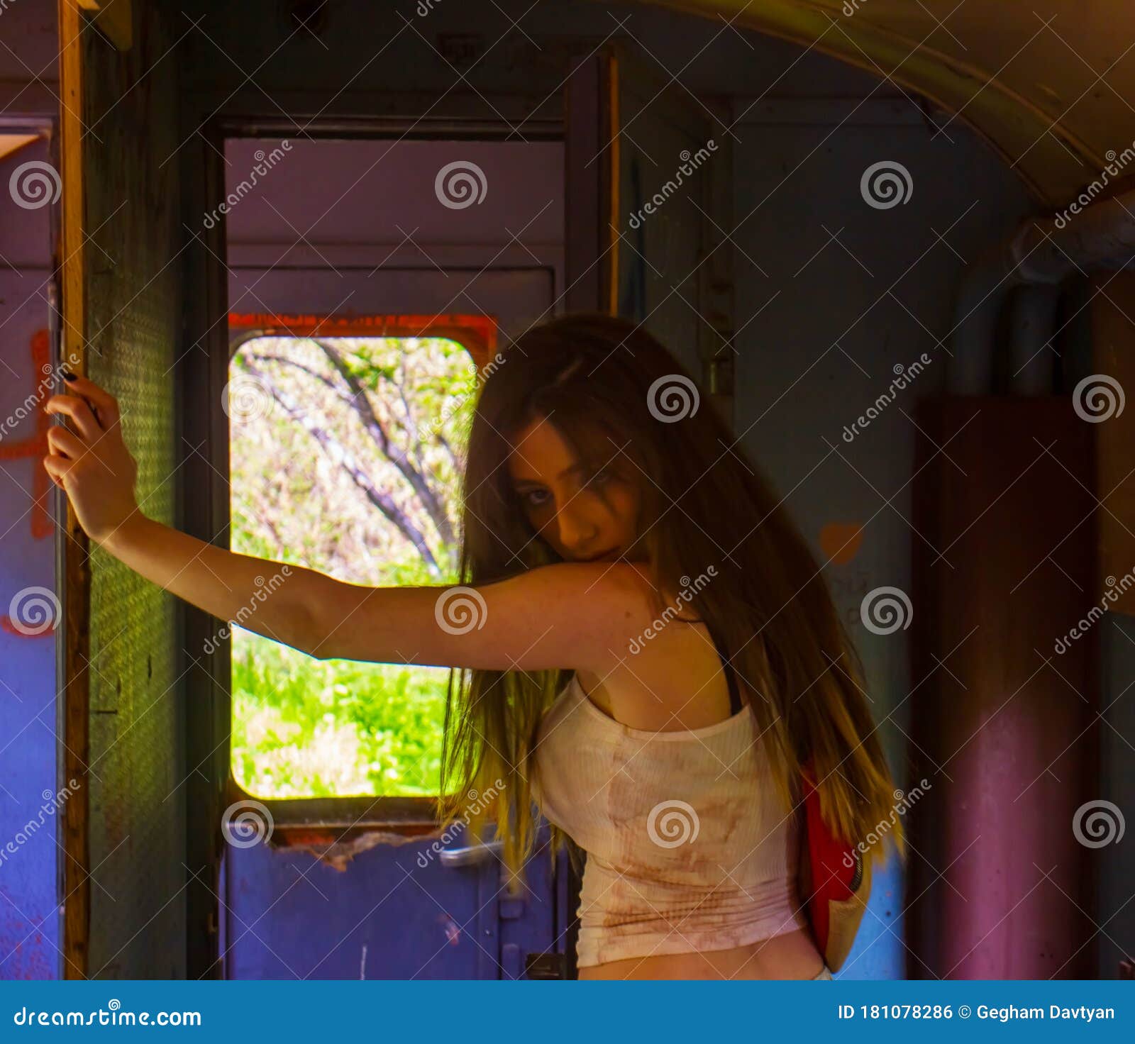 Young Woman Standing Near the Window Stock Photo - Image of black ...