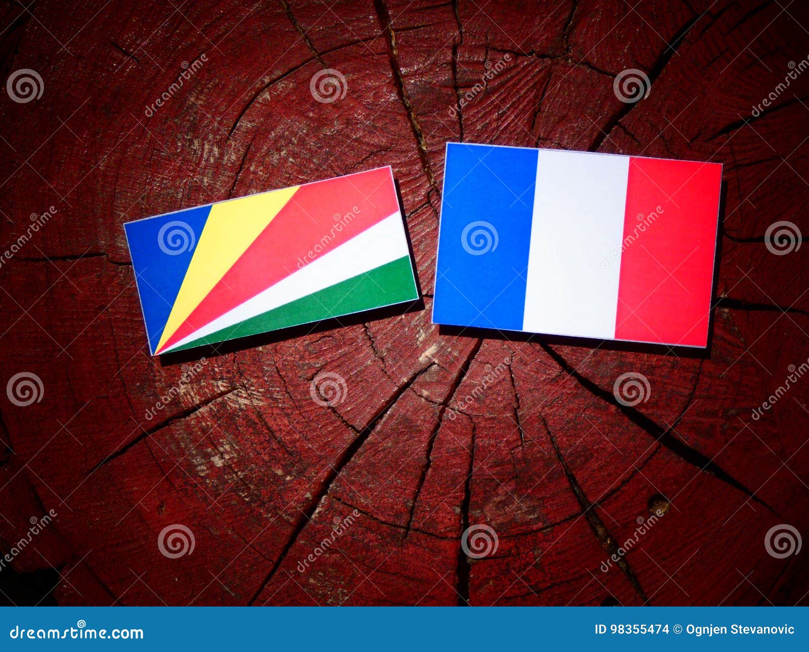 Seychelles Flag with French Flag on a Tree Stump Isolated Stock Photo ...