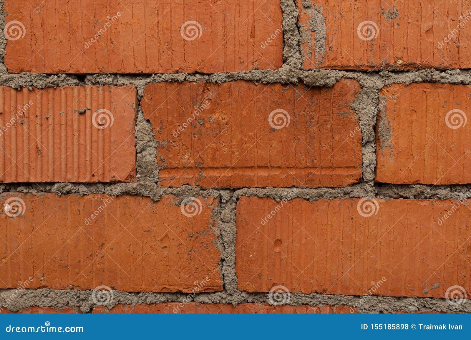 A Shabby Red Brick Wall with a Mortar in the Gaps Background Stock ...