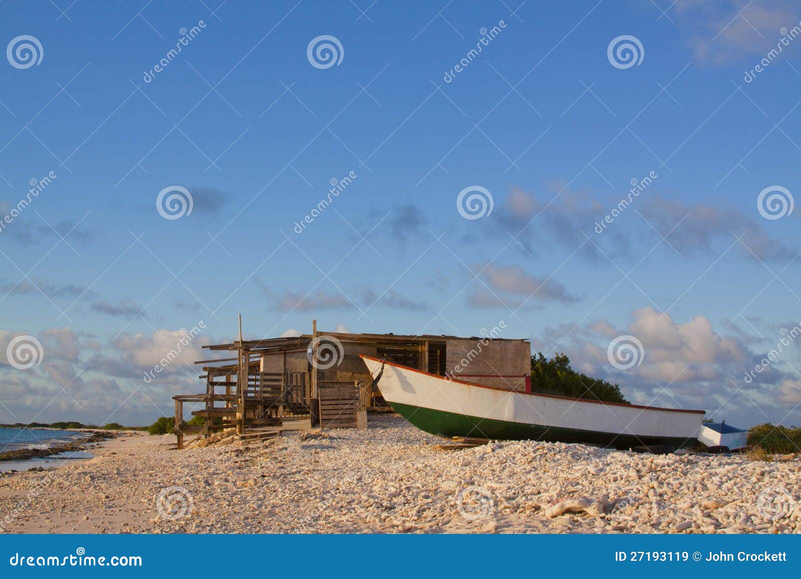 Shack on Beach with Boat stock image. Image of fishing - 27193119