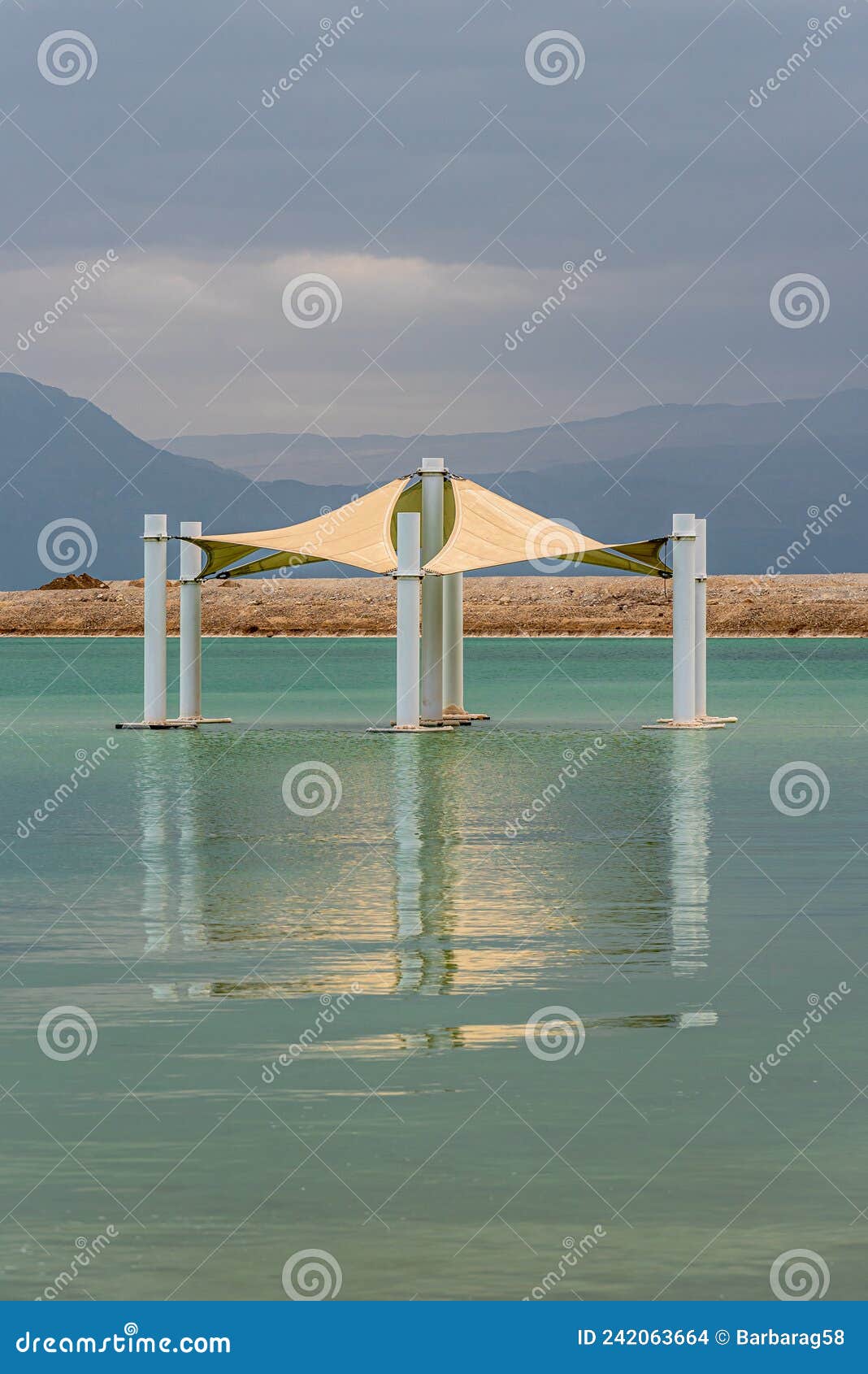 Shade Structure at the Beach of the Dead Sea Stock Photo - Image of ...