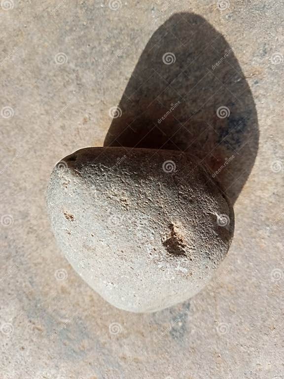 A Shaded Pile of River Rocks Consisting of Two River Rocks Stock Photo ...