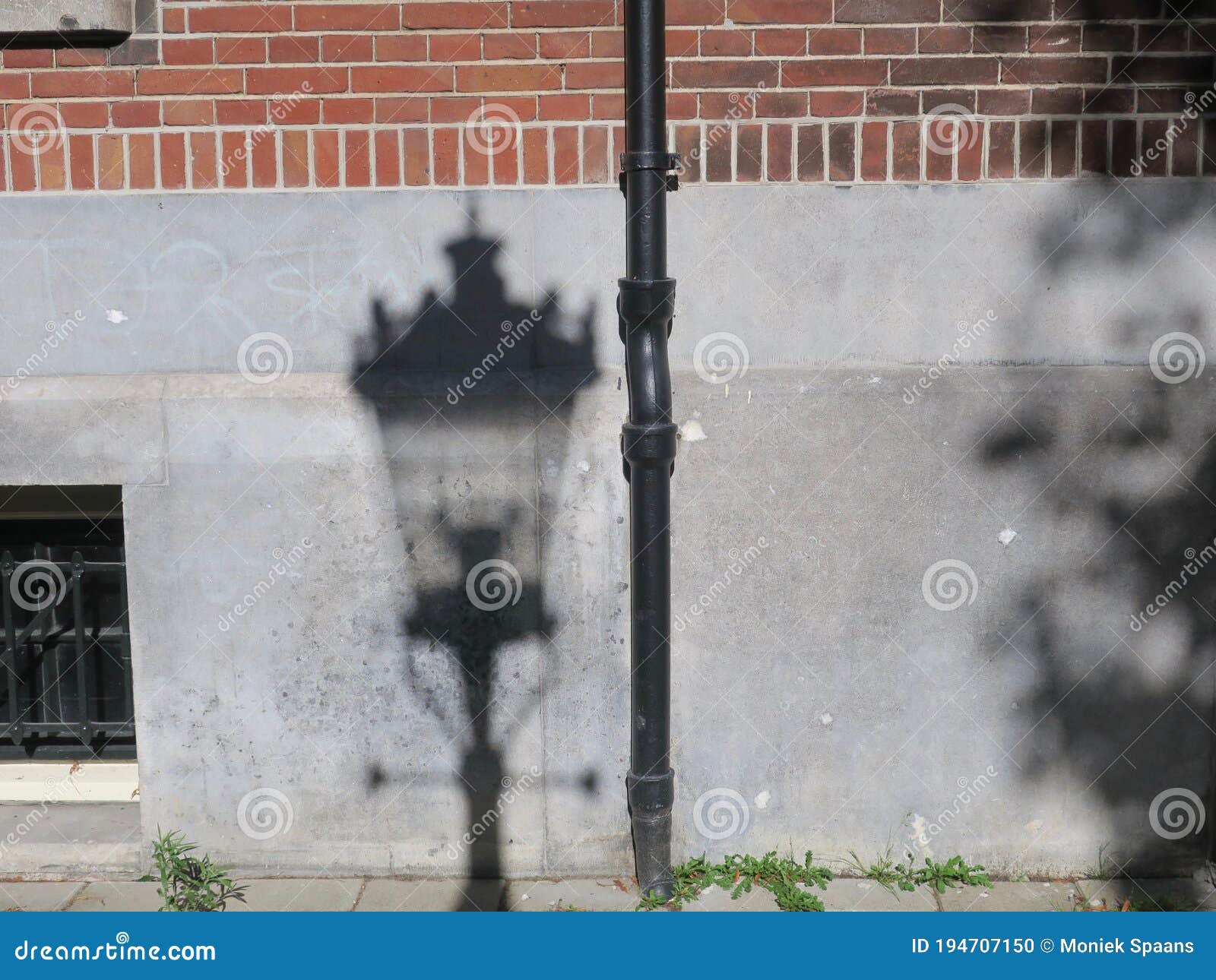 Shadow of an Antique Lantern Projected on a Stone Wall Stock Photo ...