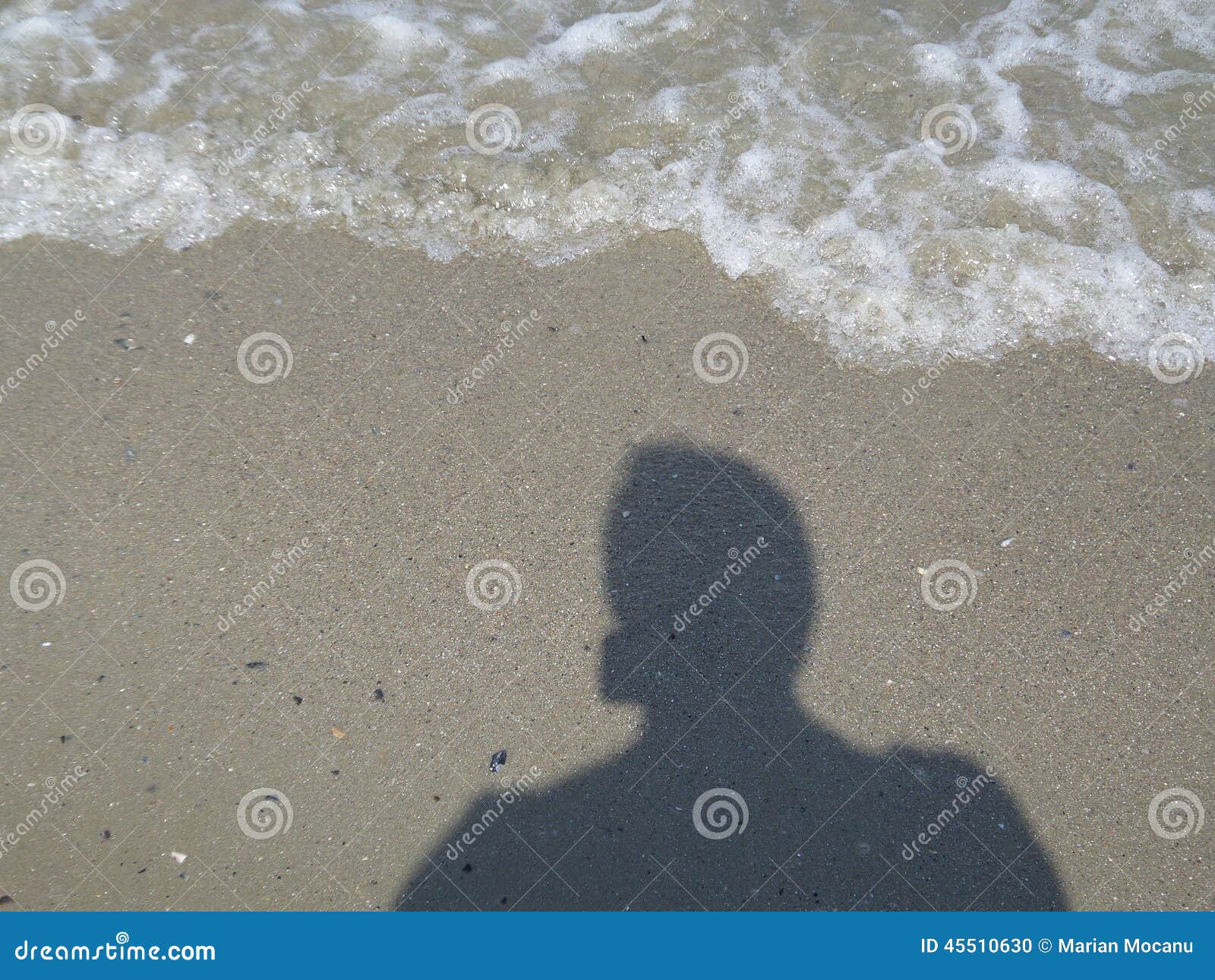Shadow on the beach. stock photo. Image of isolated, white - 45510630