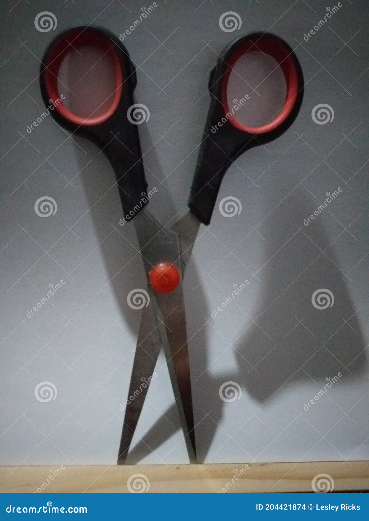 The Shadow Behind the Scissors Stock Photo - Image of pair, glasses ...