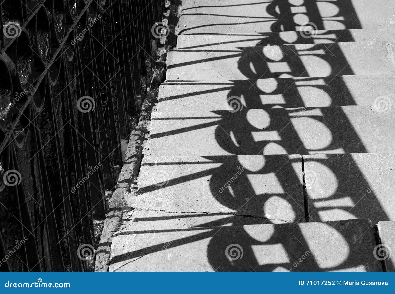 The Shadow of the Bridge Railing Stock Photo - Image of river, fence ...