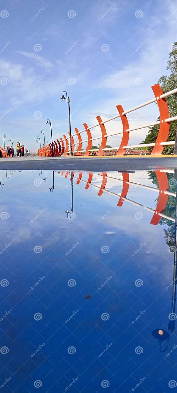 A Shadow of Bridge on Reflection Water Stock Image - Image of water ...