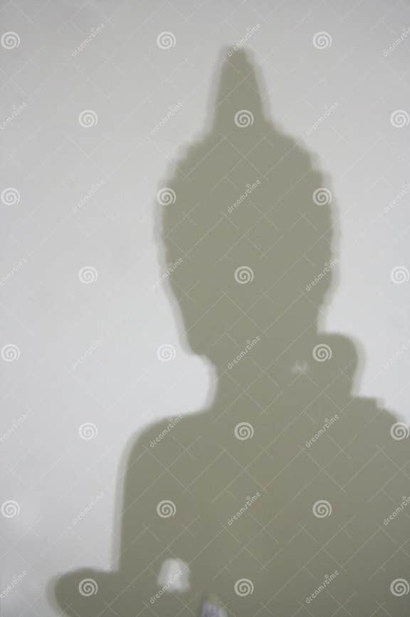 Shadow of a Buddha Statue on a White Wall. Stock Photo - Image of ...