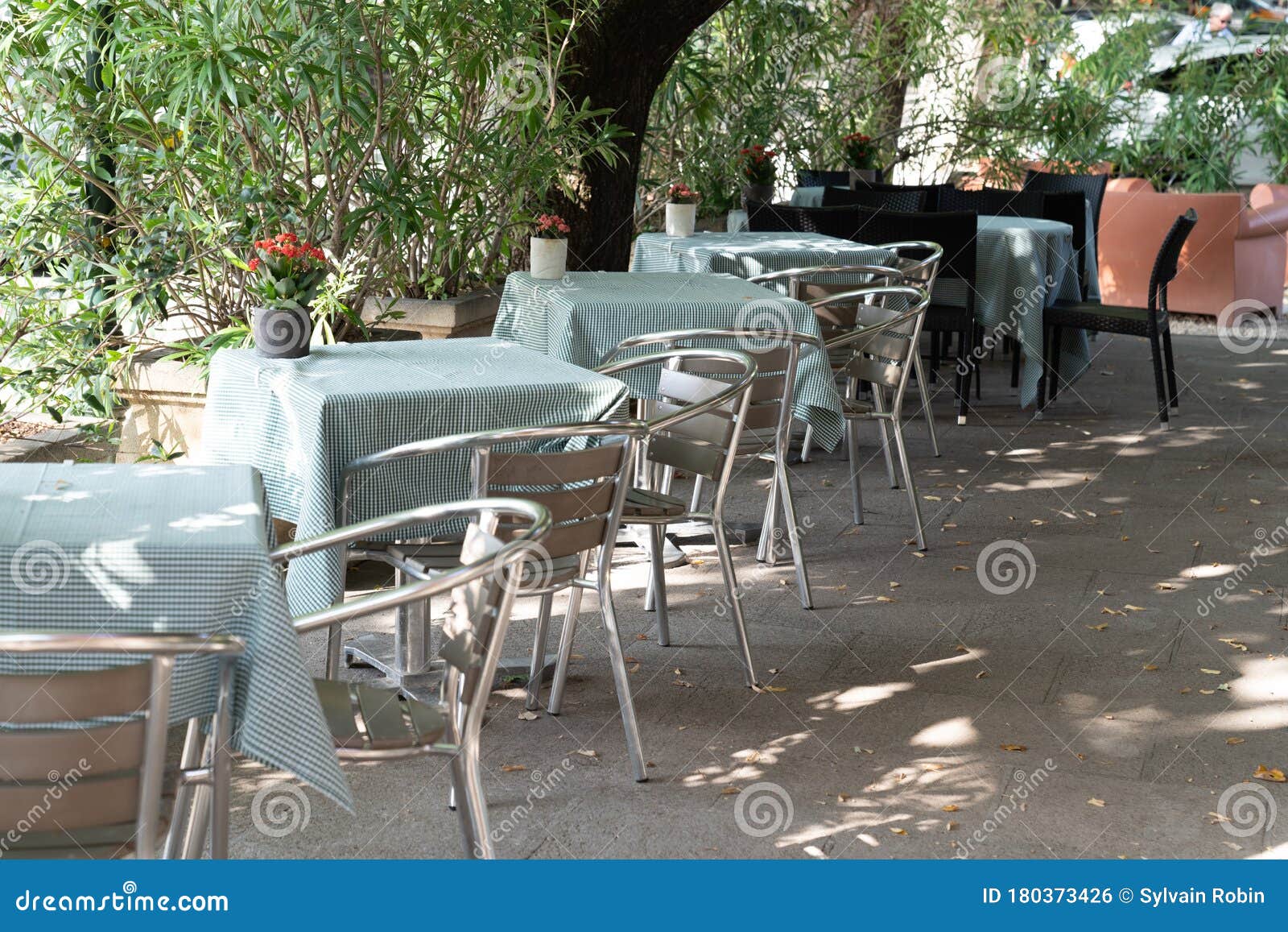 Shadow Cafe Table and Chairs on the Terrace Outside the Bar Stock Photo ...