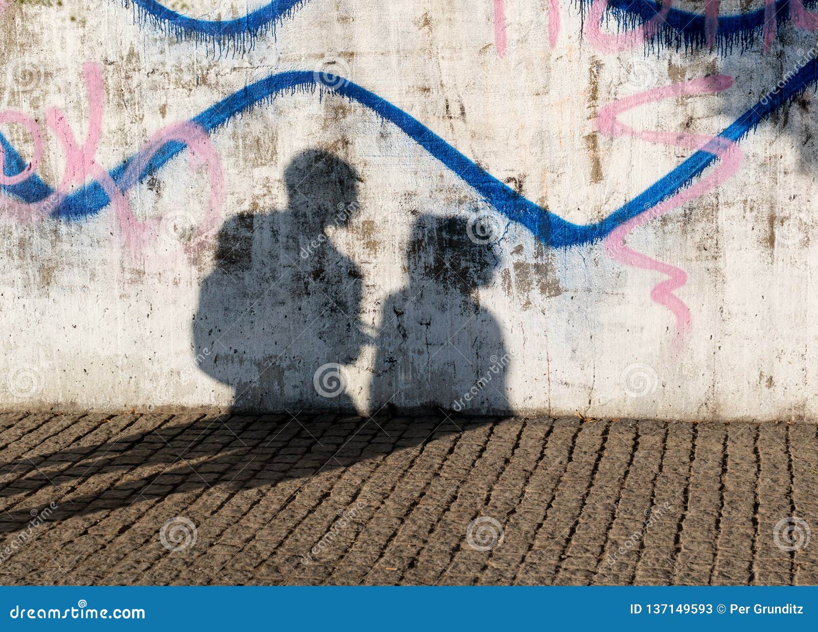 Shadow of Couple on City Concrete Wall with Graffiti Stock Image ...