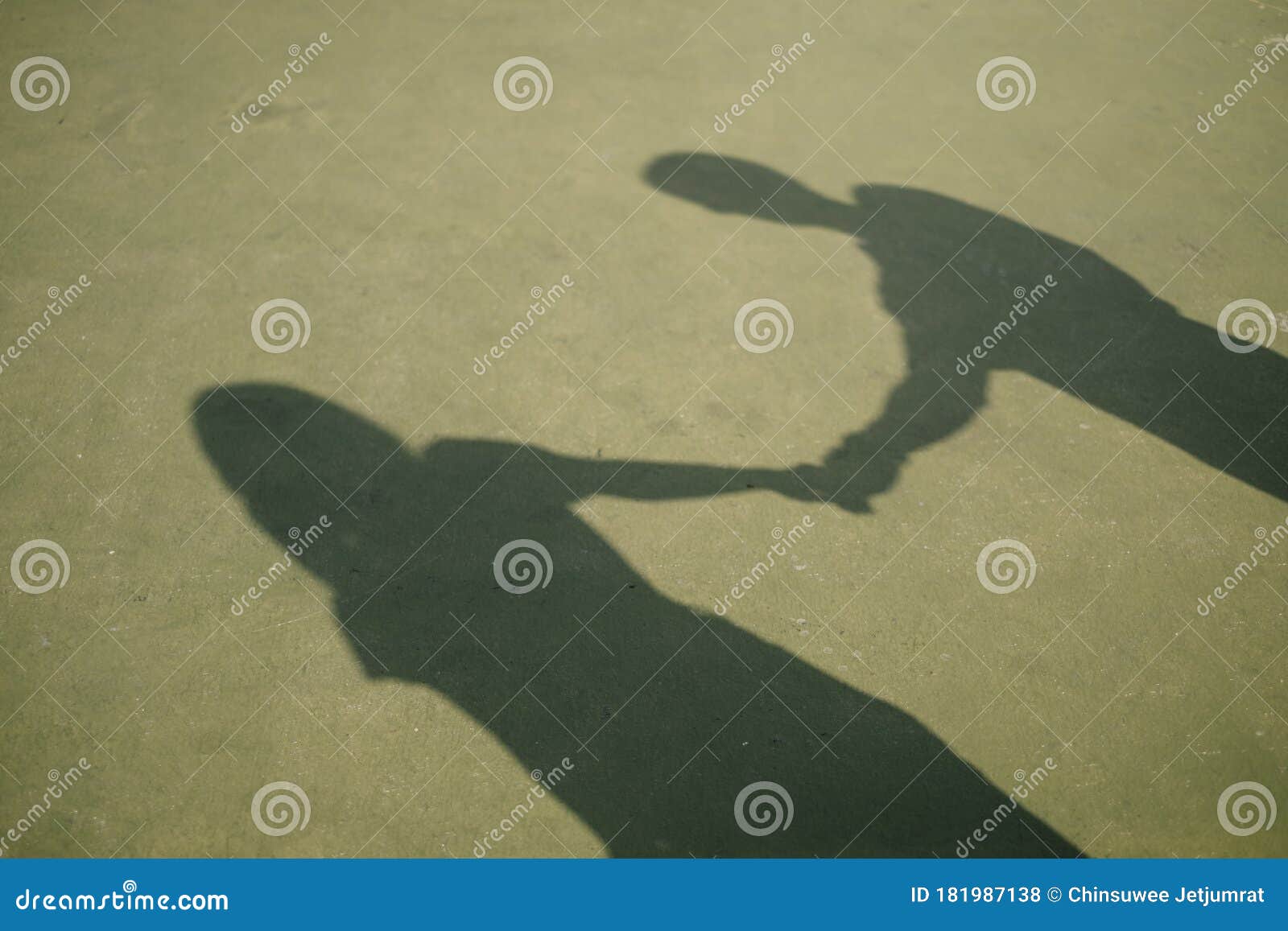 Shadow of couple on grass stock photo. Image of lovely - 181987138