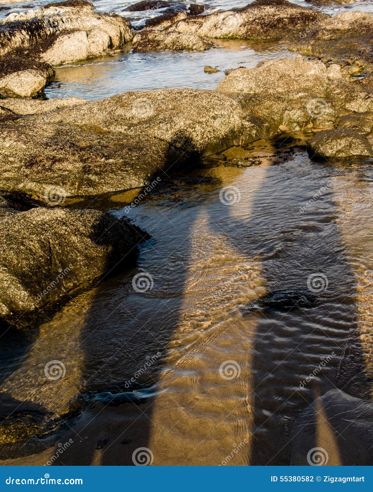 Shadow of a Couple Holding Hands on the Beach Stock Photo - Image of ...