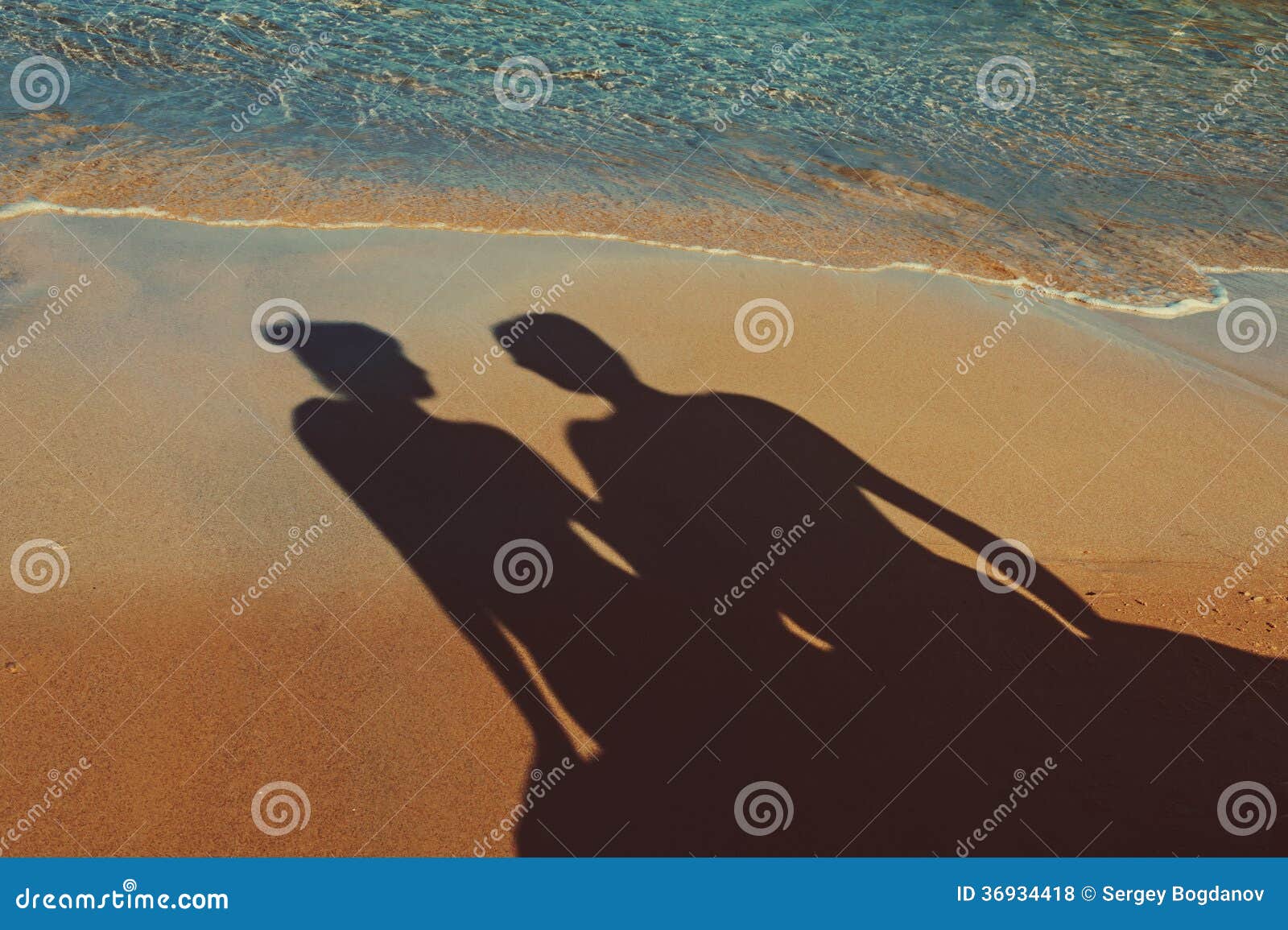Shadow of a couple stock photo. Image of romance, coastline - 36934418