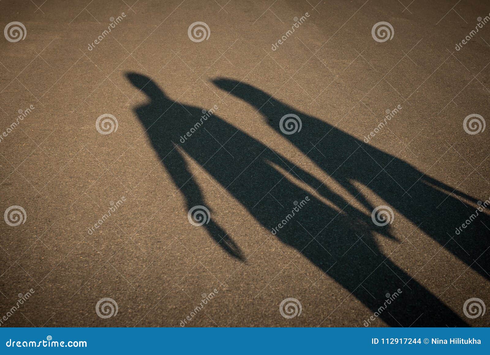 Shadow of a Couple on the Road Holding Hands Stock Photo - Image of ...
